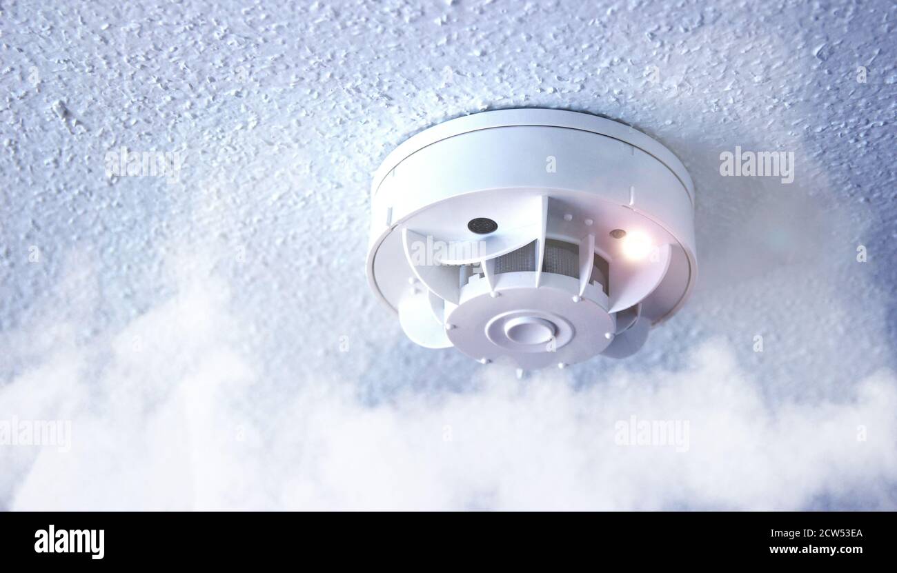 Smoke, fire detector. Fire protection, with smoke in the foreground ...
