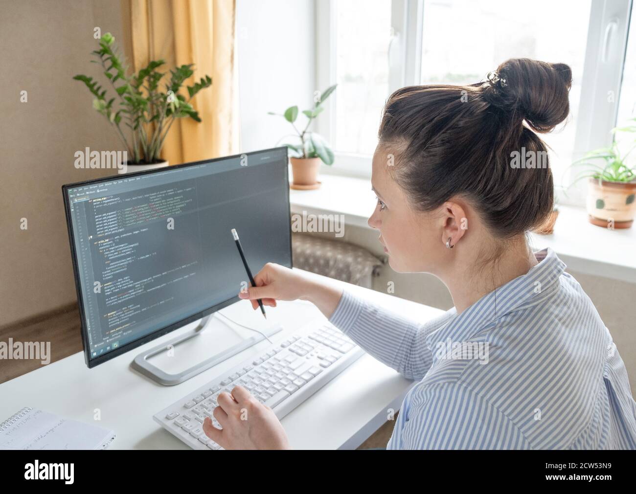 Female programmer working from home, remote, home office. Remote work ...