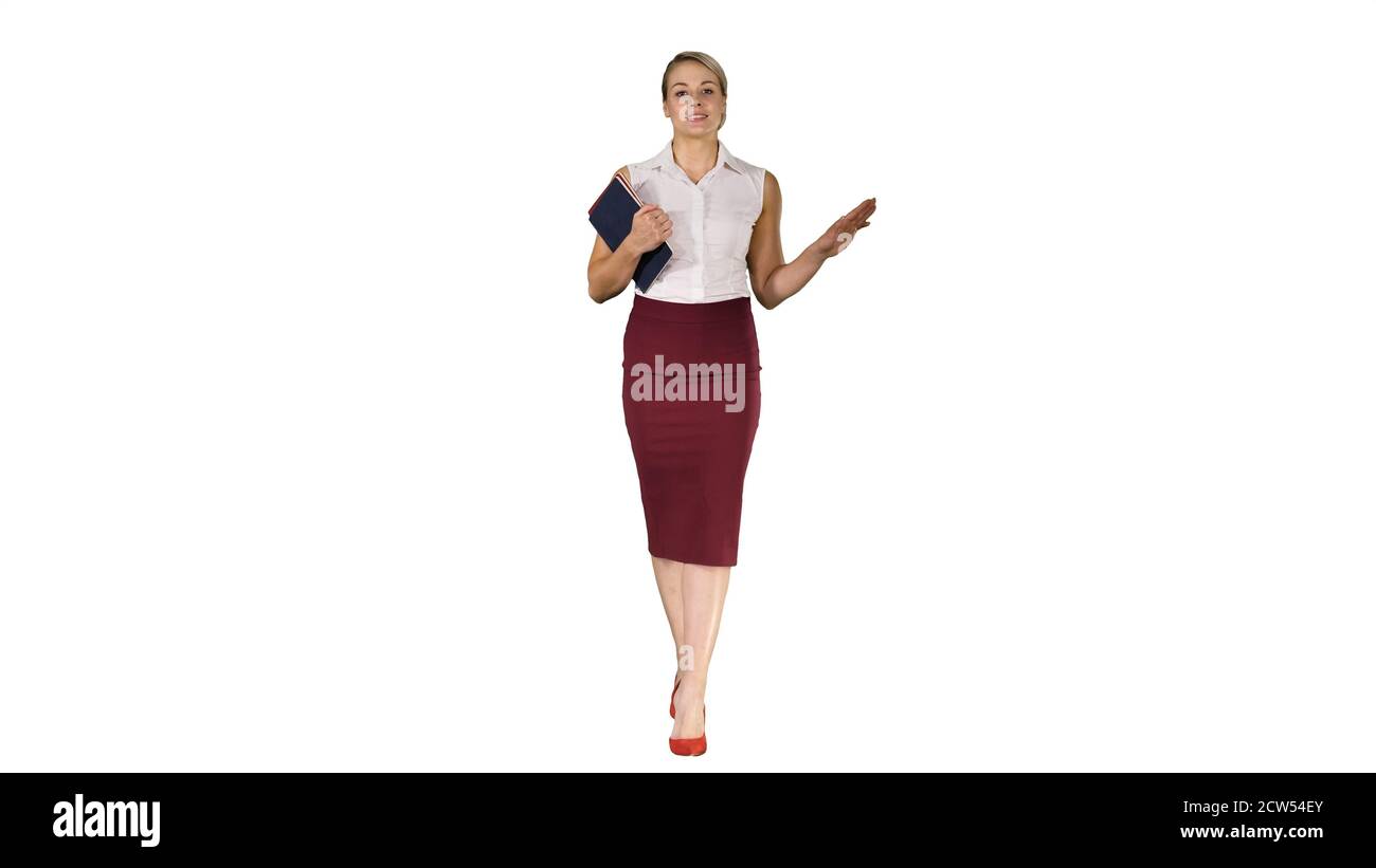 Teacher talking to the camera while walking on white background Stock ...