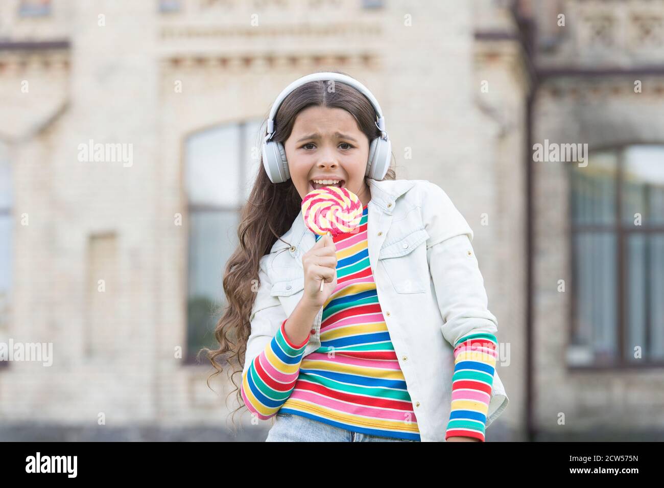 Girl modern headphones sing song lollipop mic, talented singer concept ...