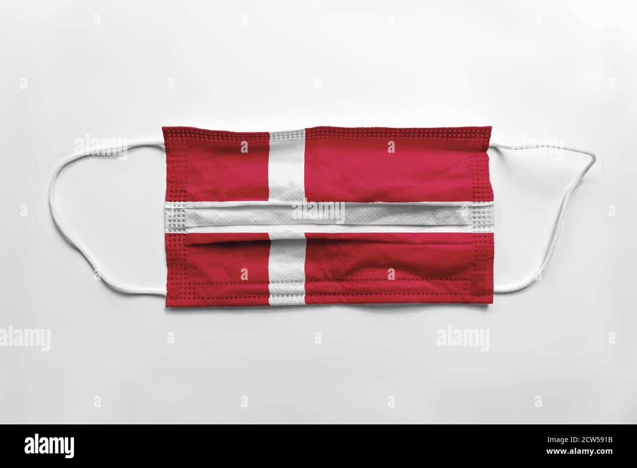 Face mask with Denmark flag printed, on white background, isolated ...