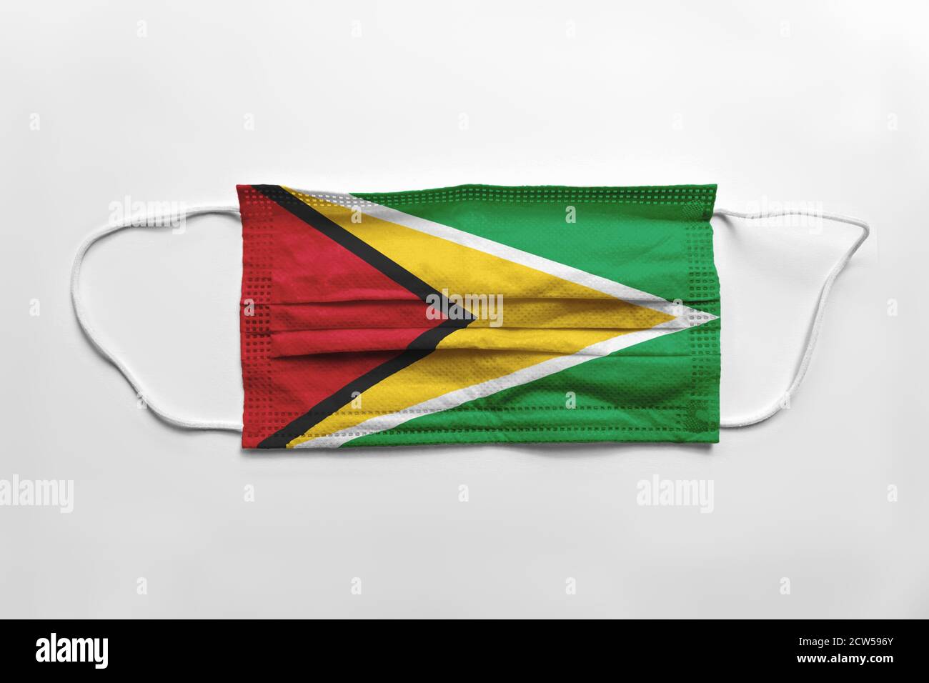 Face mask with Guyana flag printed, on white background, isolated Stock ...