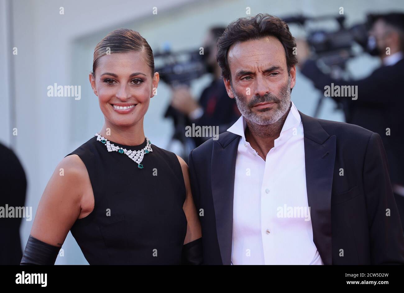 Anthony Delon and Sveva Alviti pose on the red carpet during the 77th ...