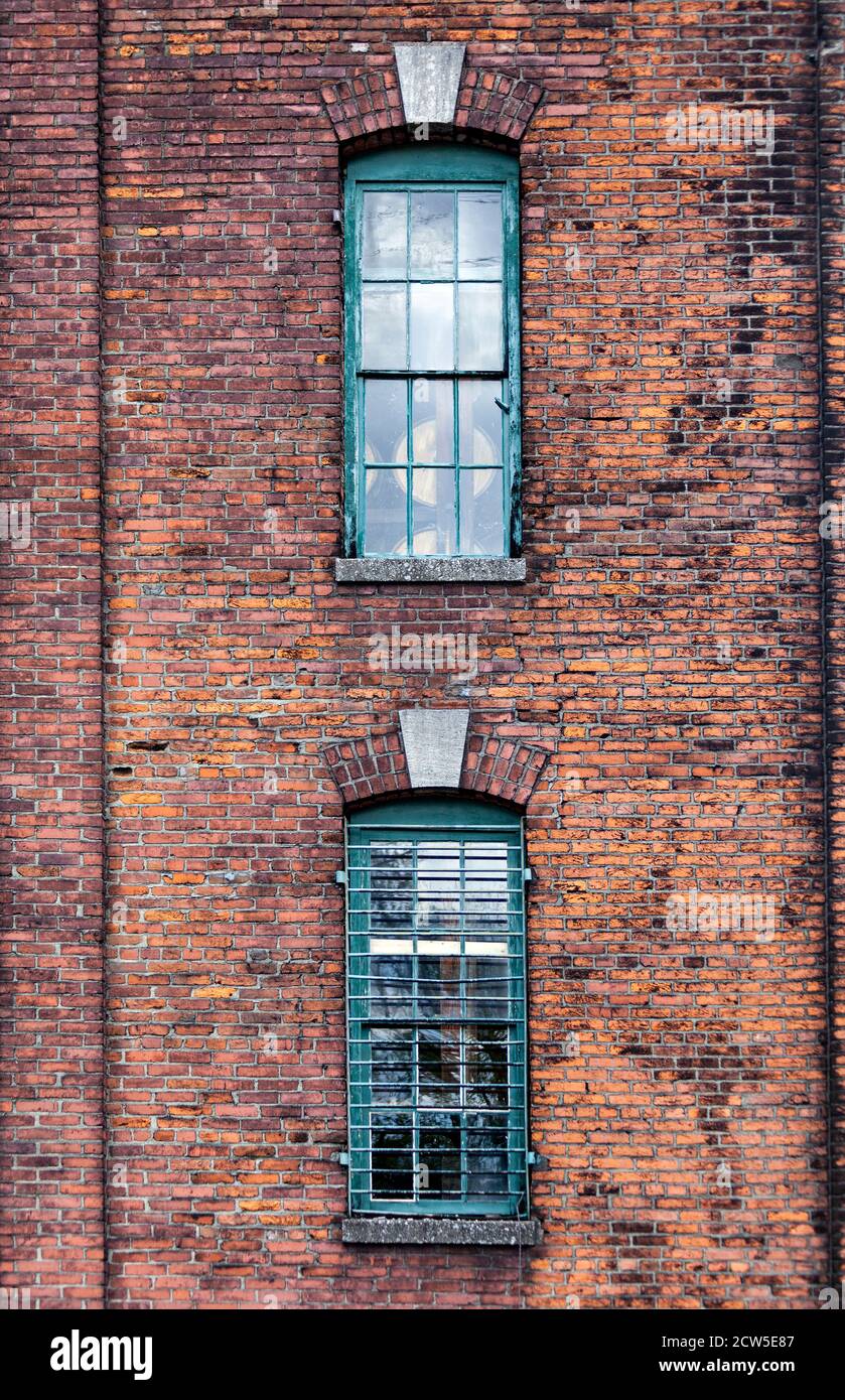 Brick, Bars & Windows Stock Photo - Alamy