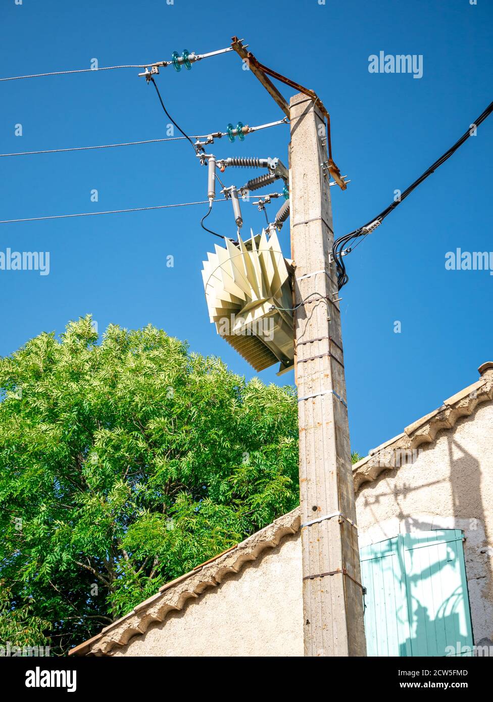 electric pole in a small village in the Provence back country in summer ...