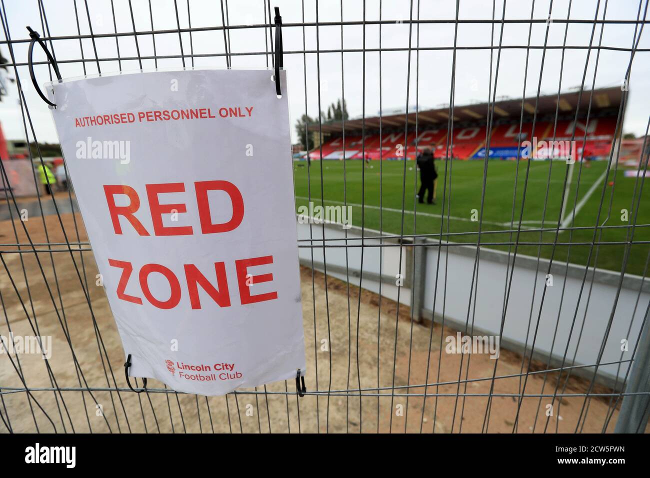 A Red Zone access zone sign at LNER Stadium, Lincoln Stock Photo - Alamy