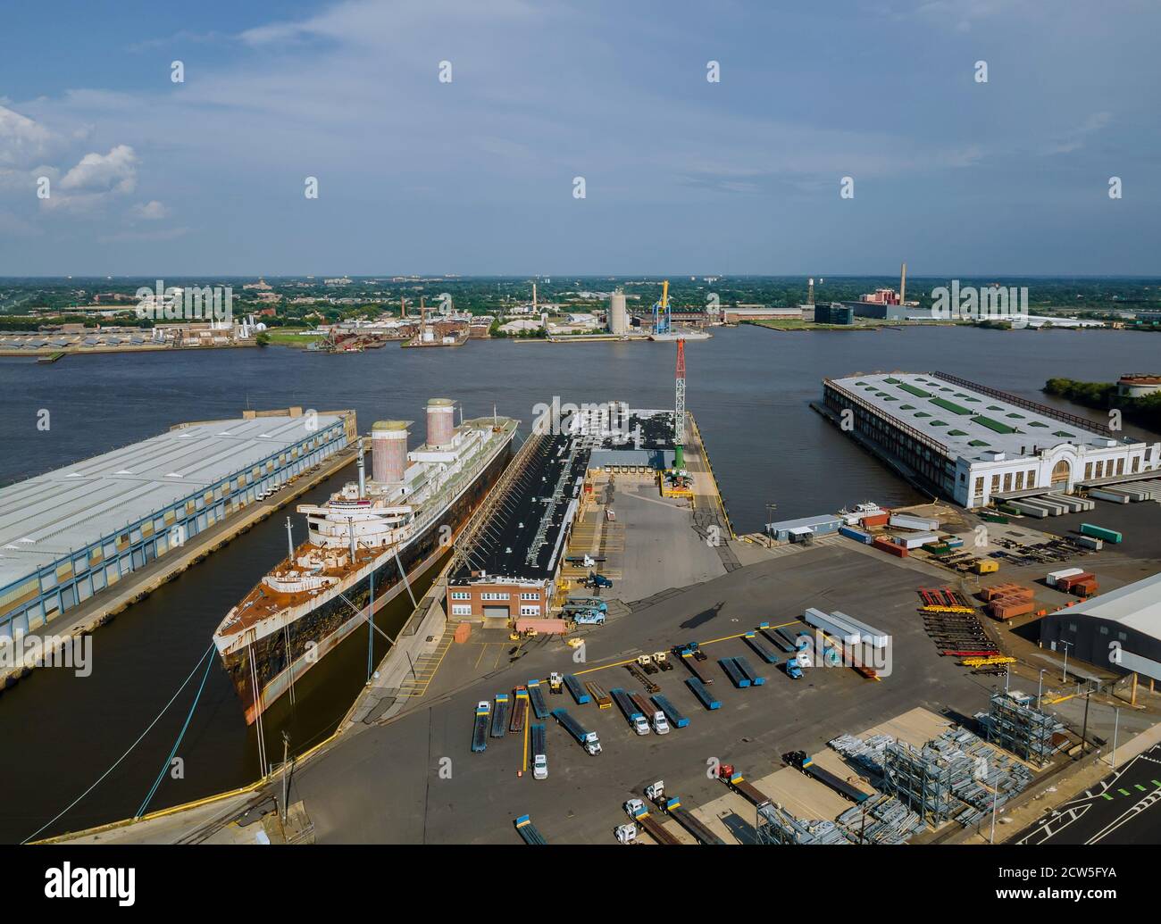 Shipyard industry aerial view of large ship big tanker under repairing ...