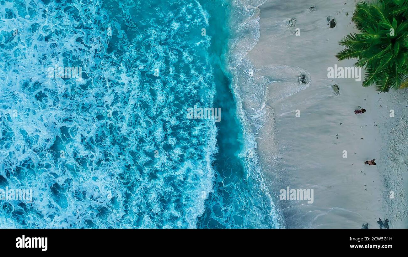 Overhead aerial view of beautiful sandy beach with waves Stock Photo ...