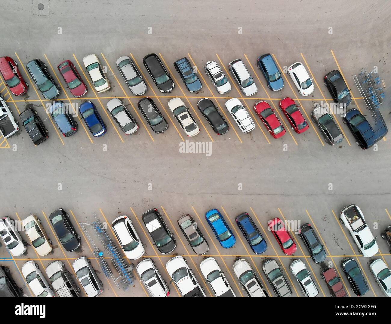 Aerial view of cars at large outdoor parking lots, USA. Outlet mall ...