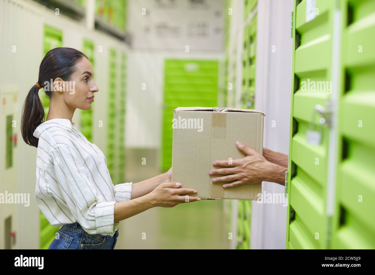 Couple handing out hi-res stock photography and images - Alamy