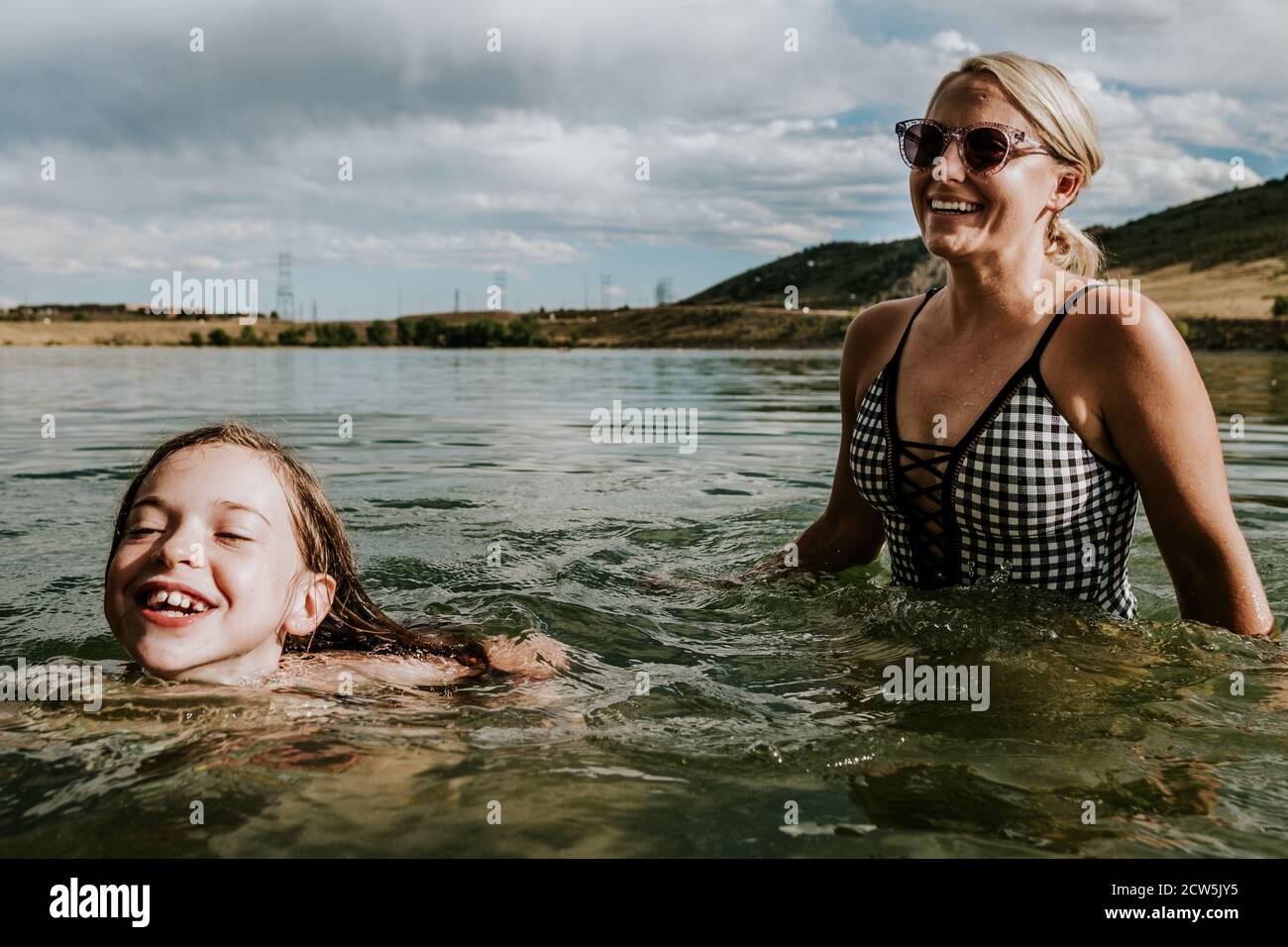 Cheerful wet teen girl hi-res stock photography and images - Alamy