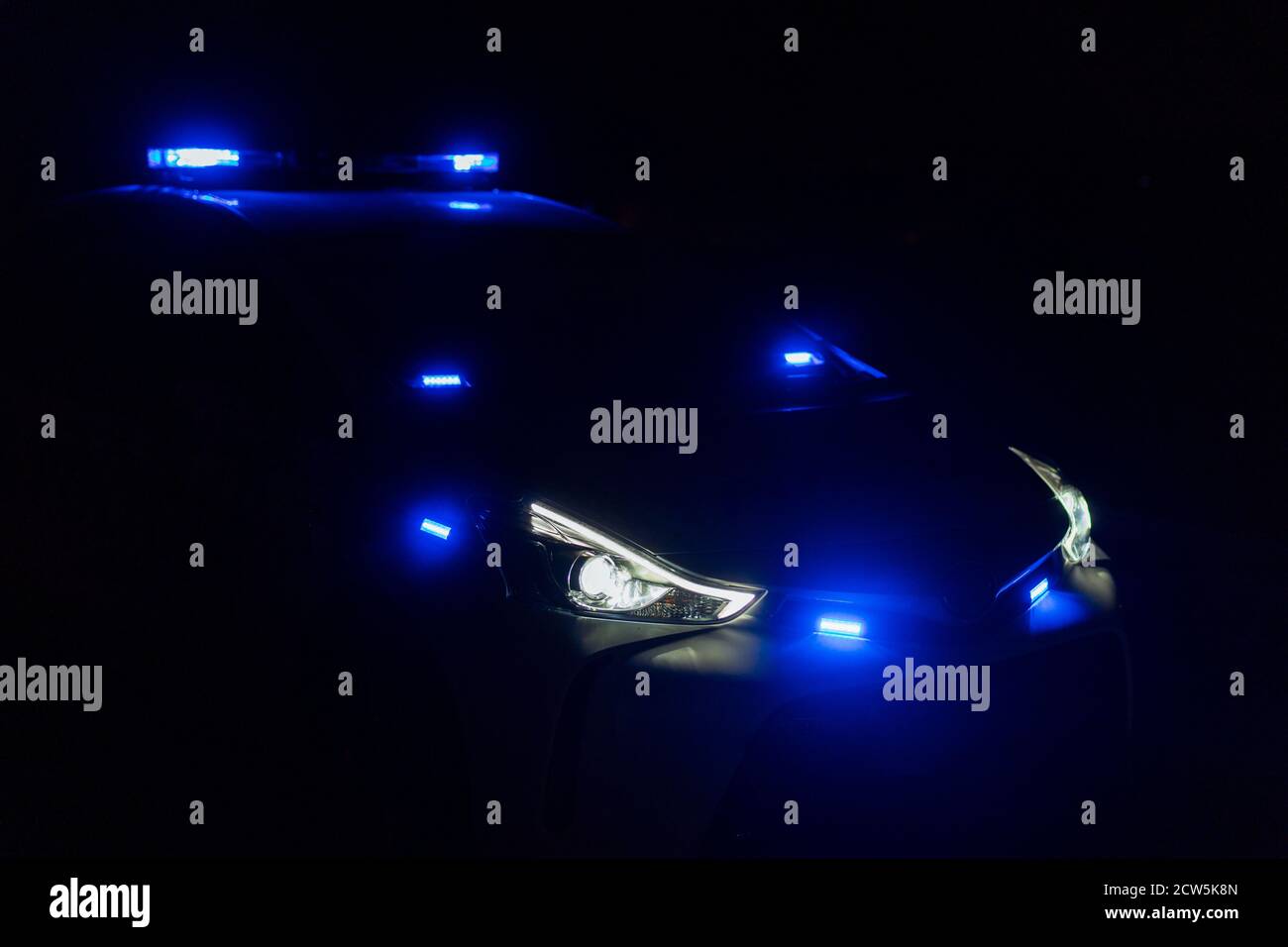 police car with lights on in emergency mission Stock Photo - Alamy
