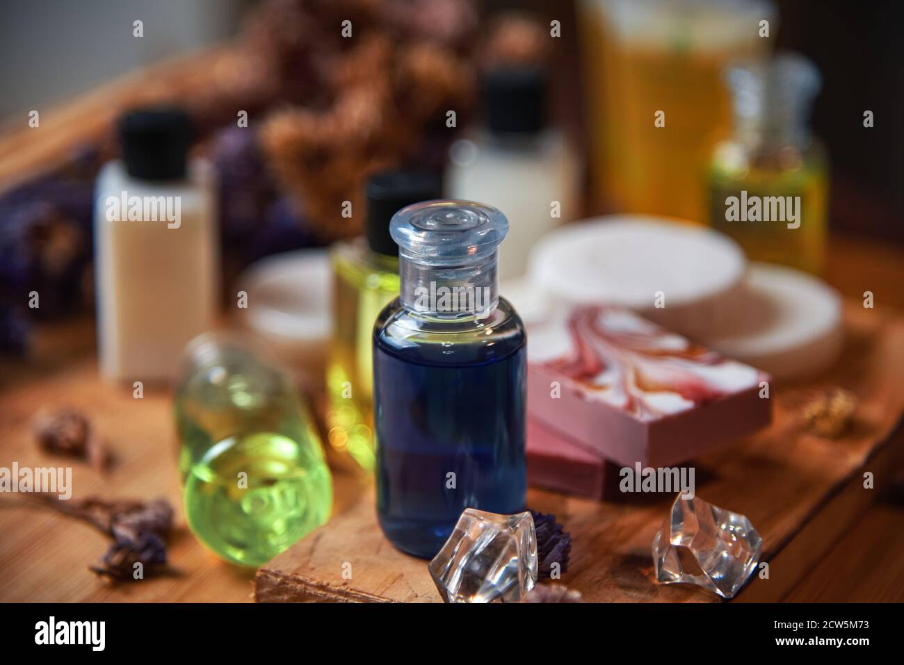 Bottles of shampoo and soap for the spa on the wood Stock Photo - Alamy