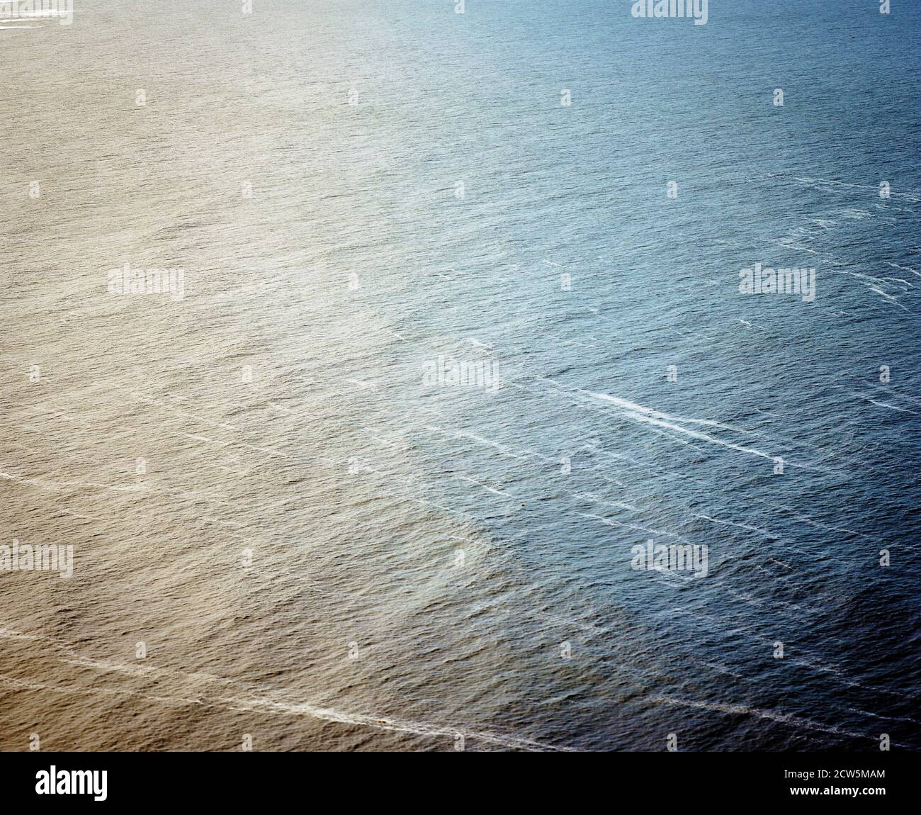 Orange and blue water texture on the Pacific Ocean Stock Photo - Alamy