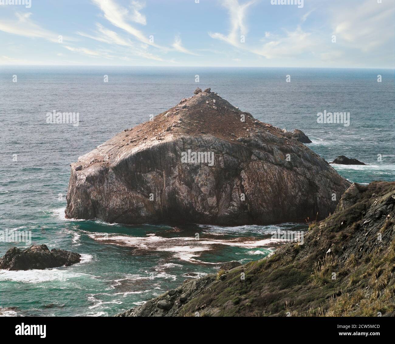 Boulder just off the Big Sur, California coast in Pacific Ocean Stock ...