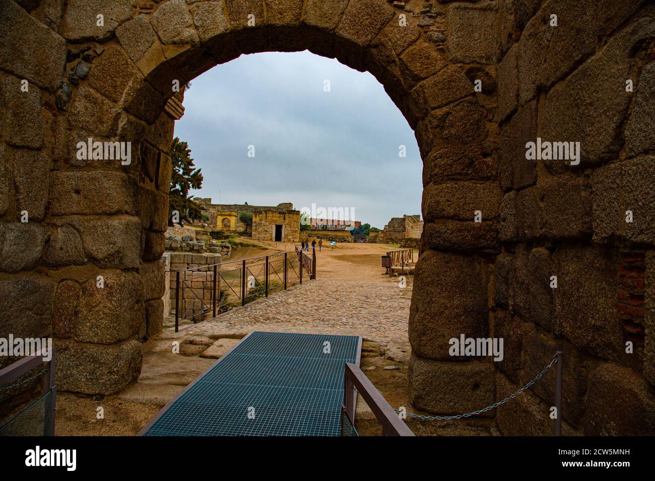 Ancient stone arch of entrance to monumental archaeological complex ...