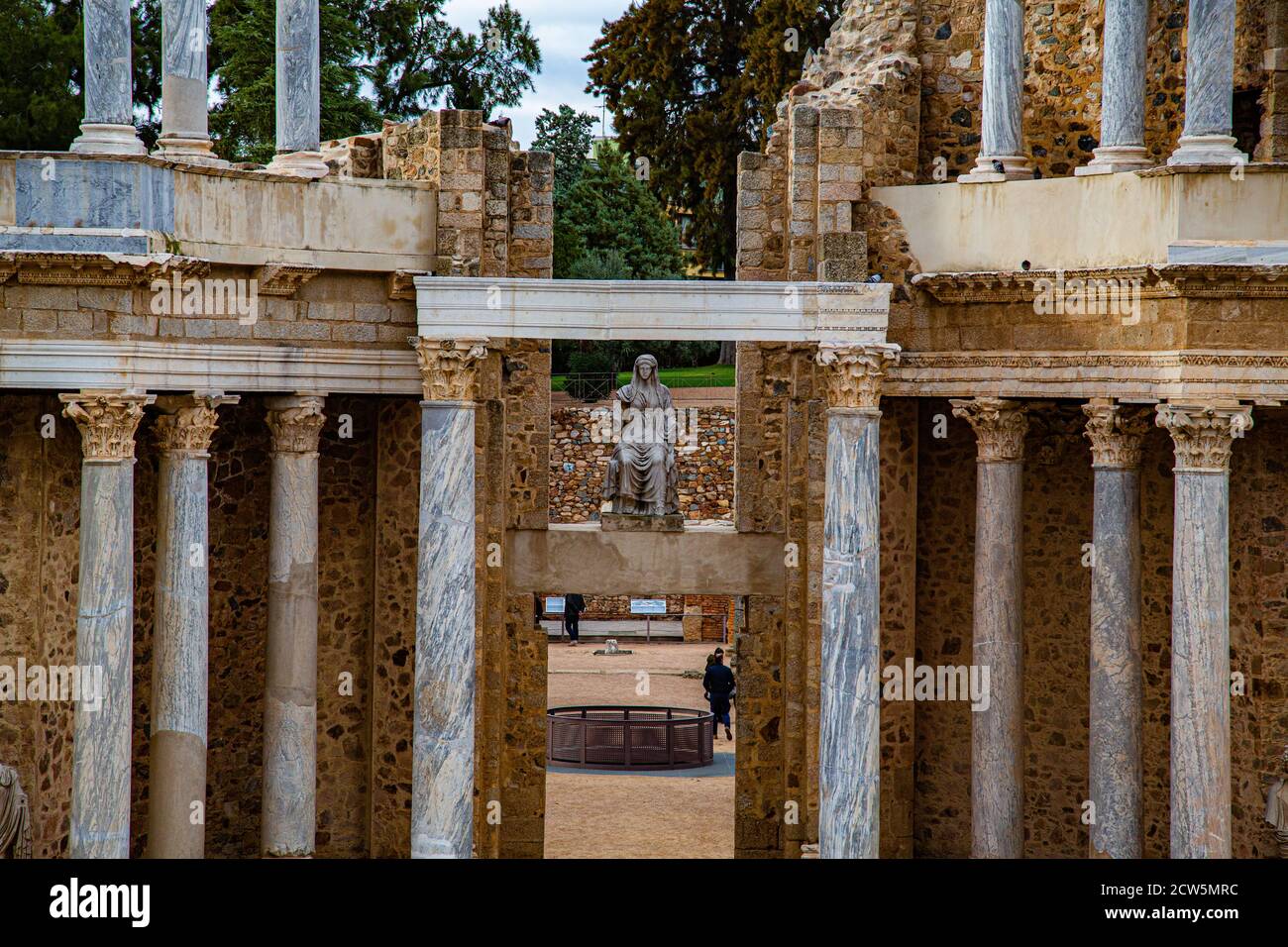 Marble columns and statue in the center of the Roman stage Stock Photo ...