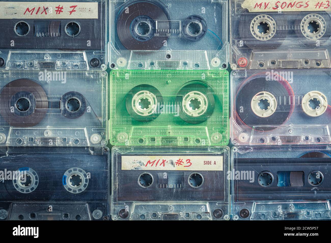Vintage cassette tapes arranged in a grid on blue sofa Stock Photo - Alamy