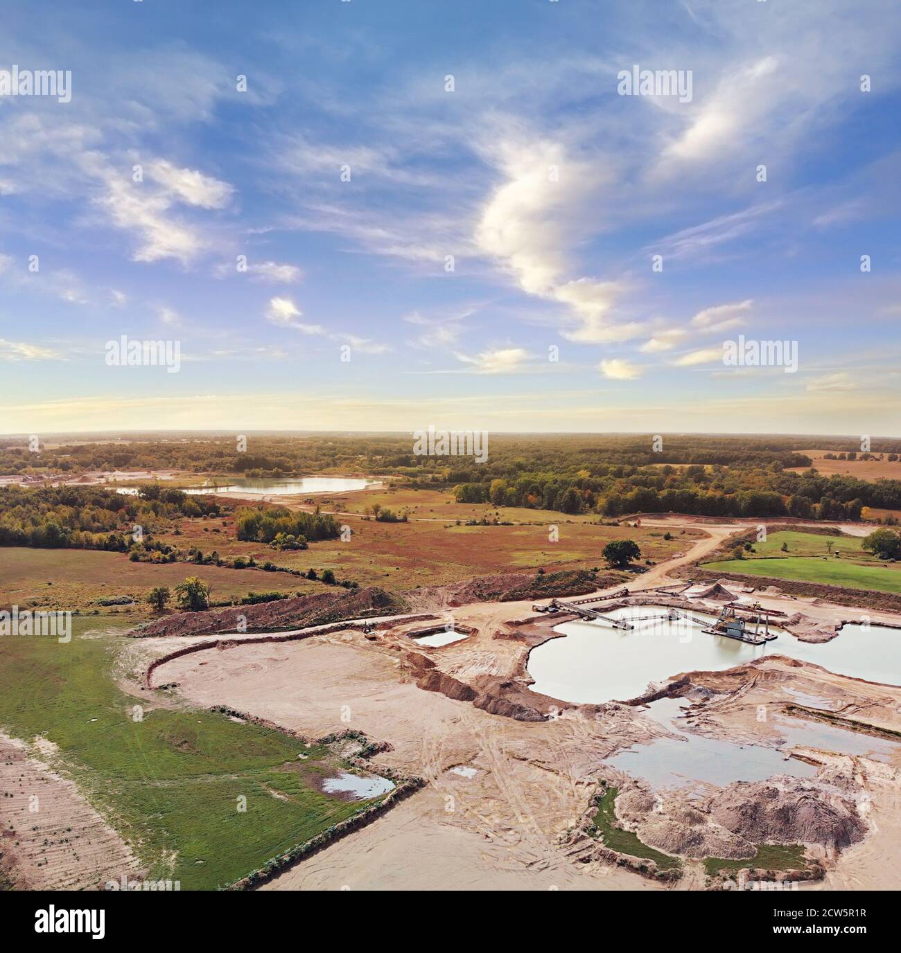 Aerial view of a sand, gravel mine quarry full with water Stock Photo ...