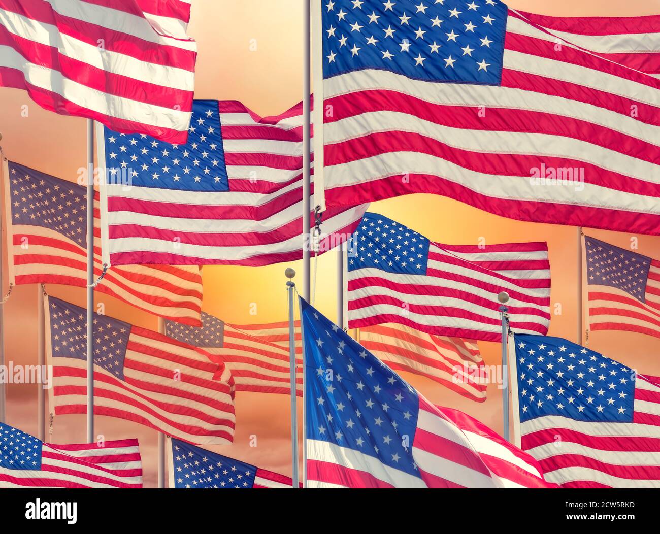 Beautiful American flags waving against sunset Stock Photo - Alamy