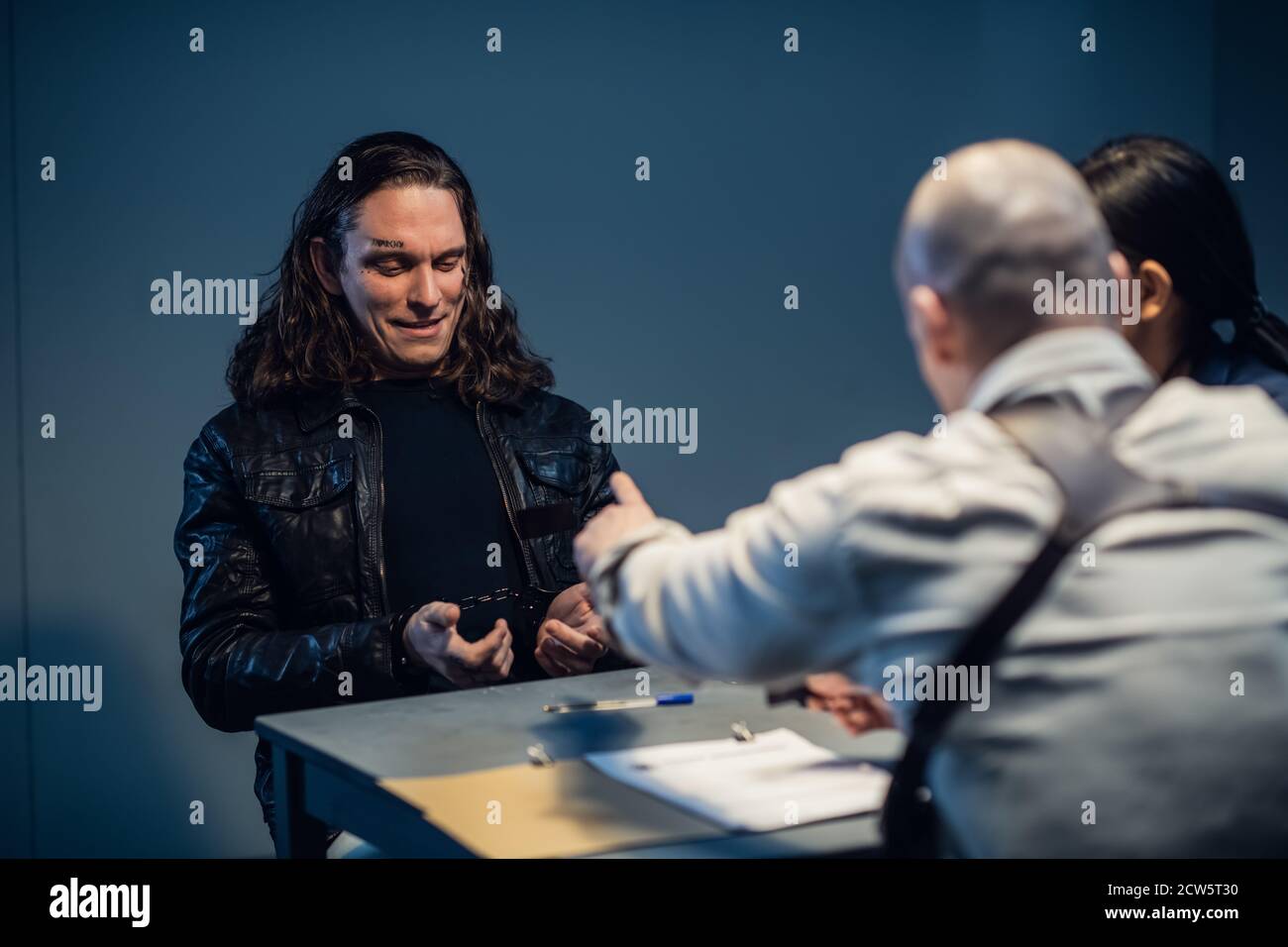 Interrogation of a homicidal maniac in the interrogation room. A police ...