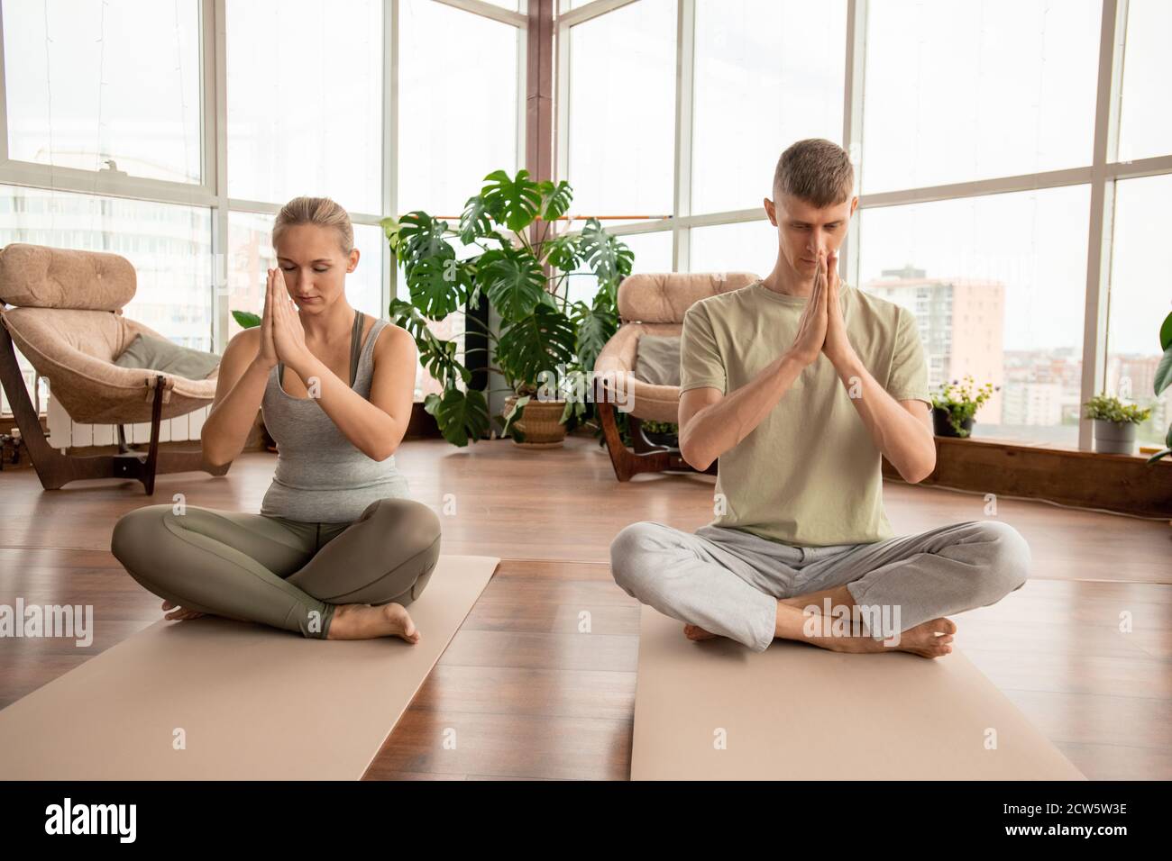 Couple in lotus position hi-res stock photography and images - Alamy