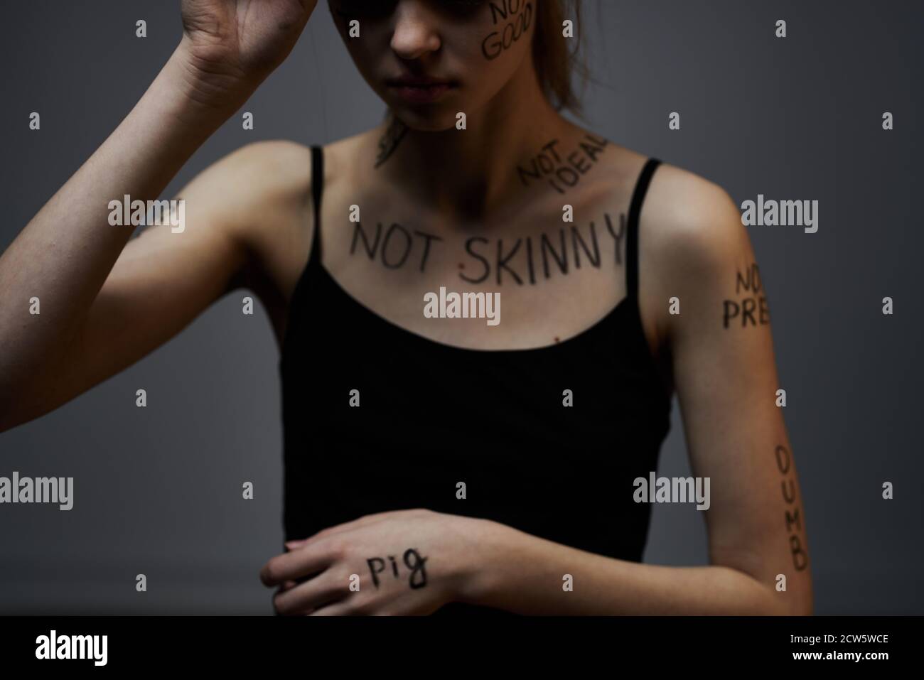 Woman with inscriptions on the body frustration and dissatisfaction ...