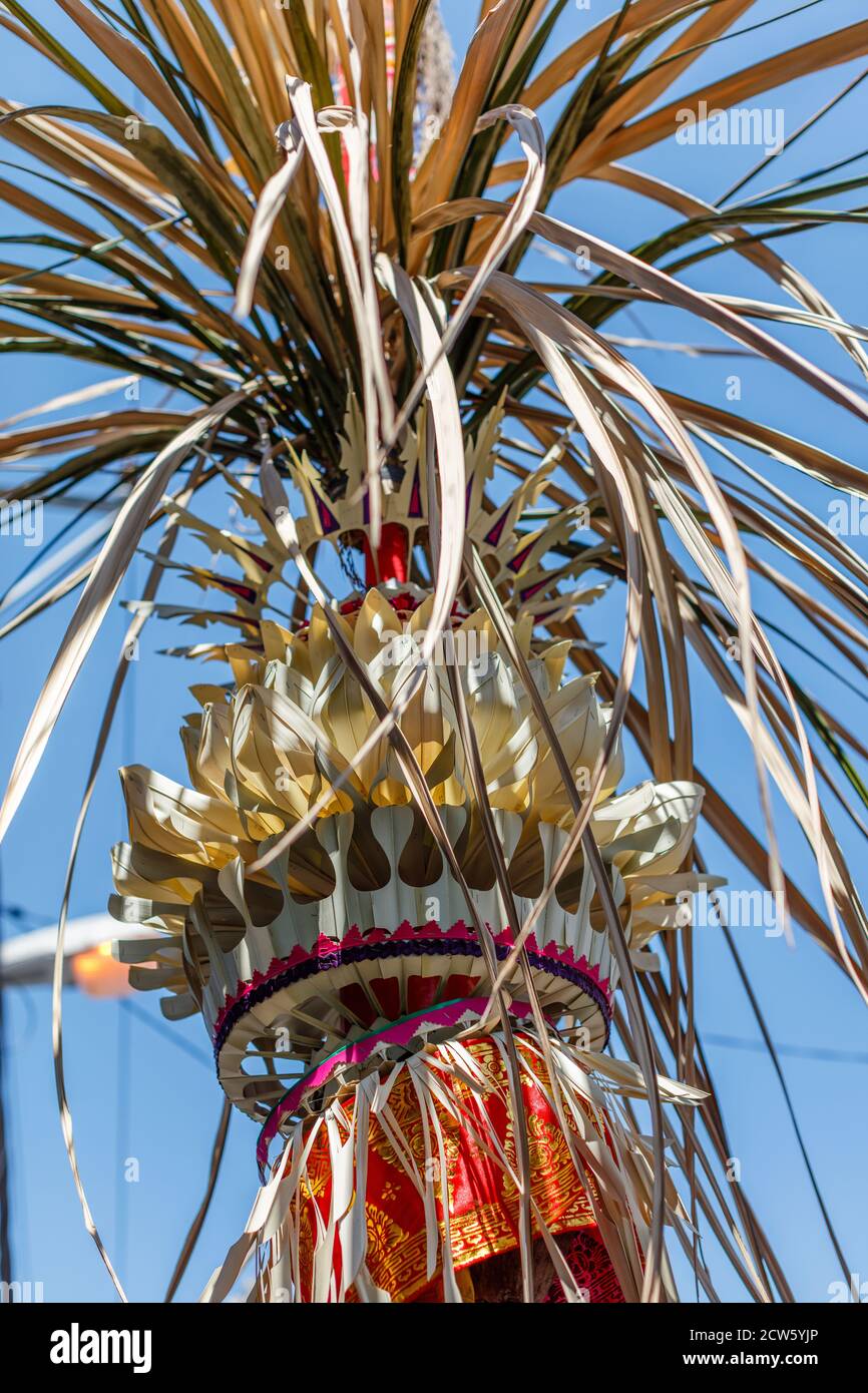 Penjor - street thatched bamboo poles for Galungan celebration of ...