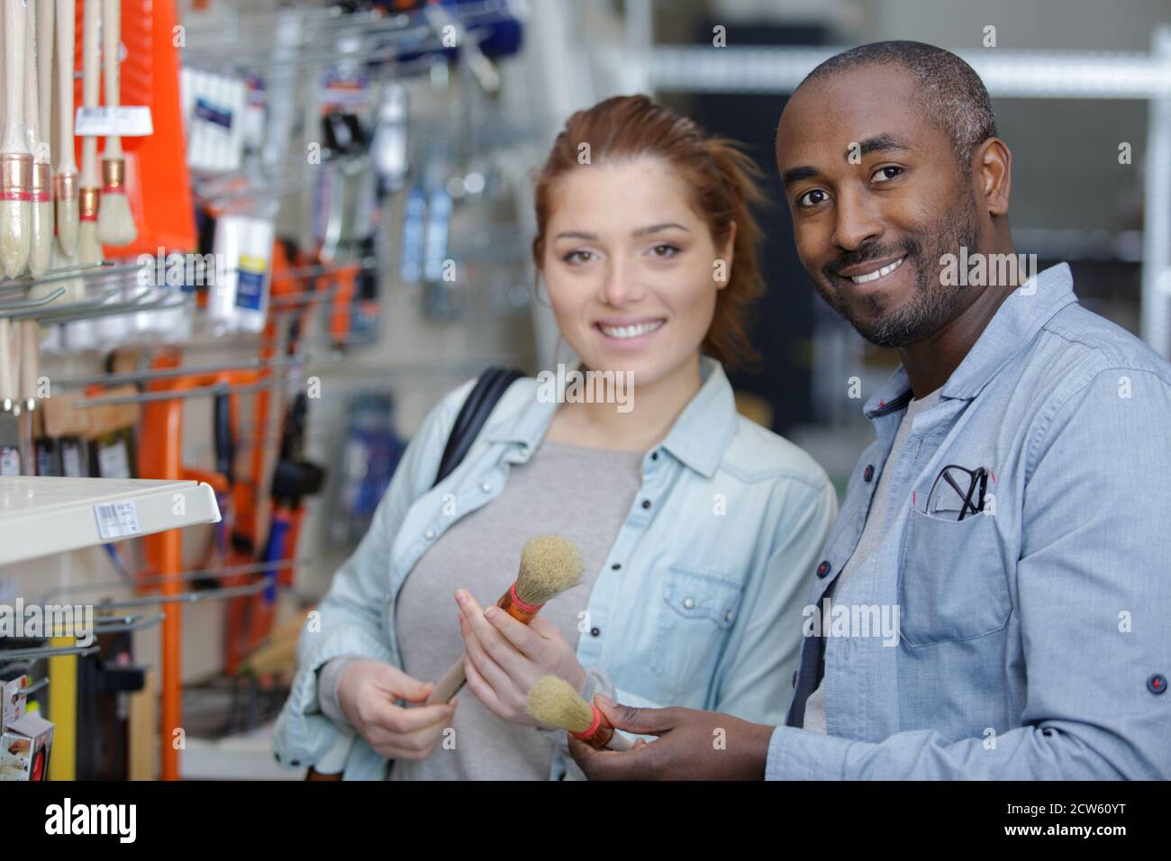a beautiful couple choosing tools Stock Photo - Alamy