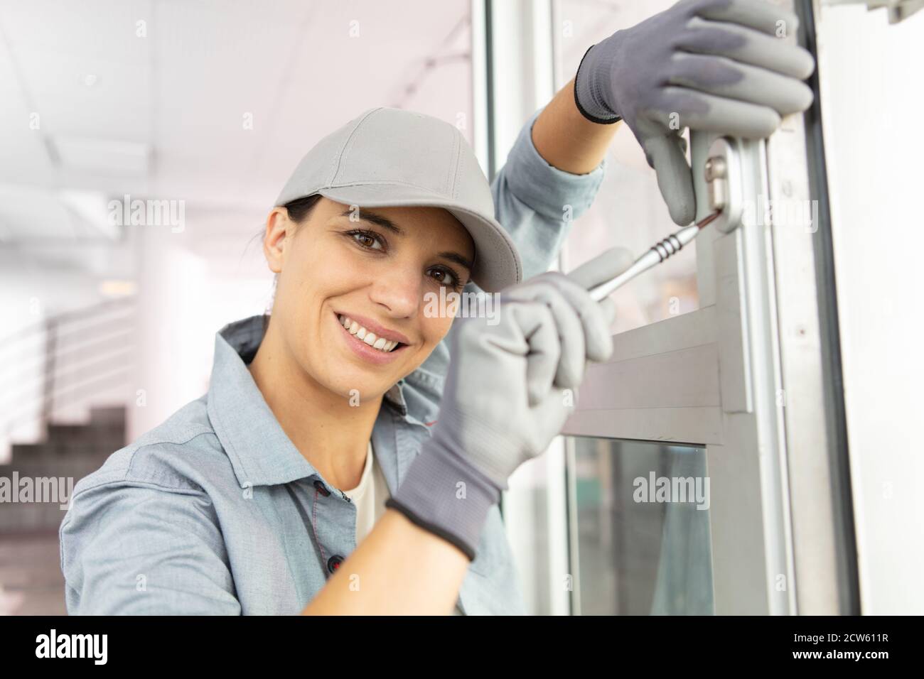 Happy female builder using hi-res stock photography and images - Alamy