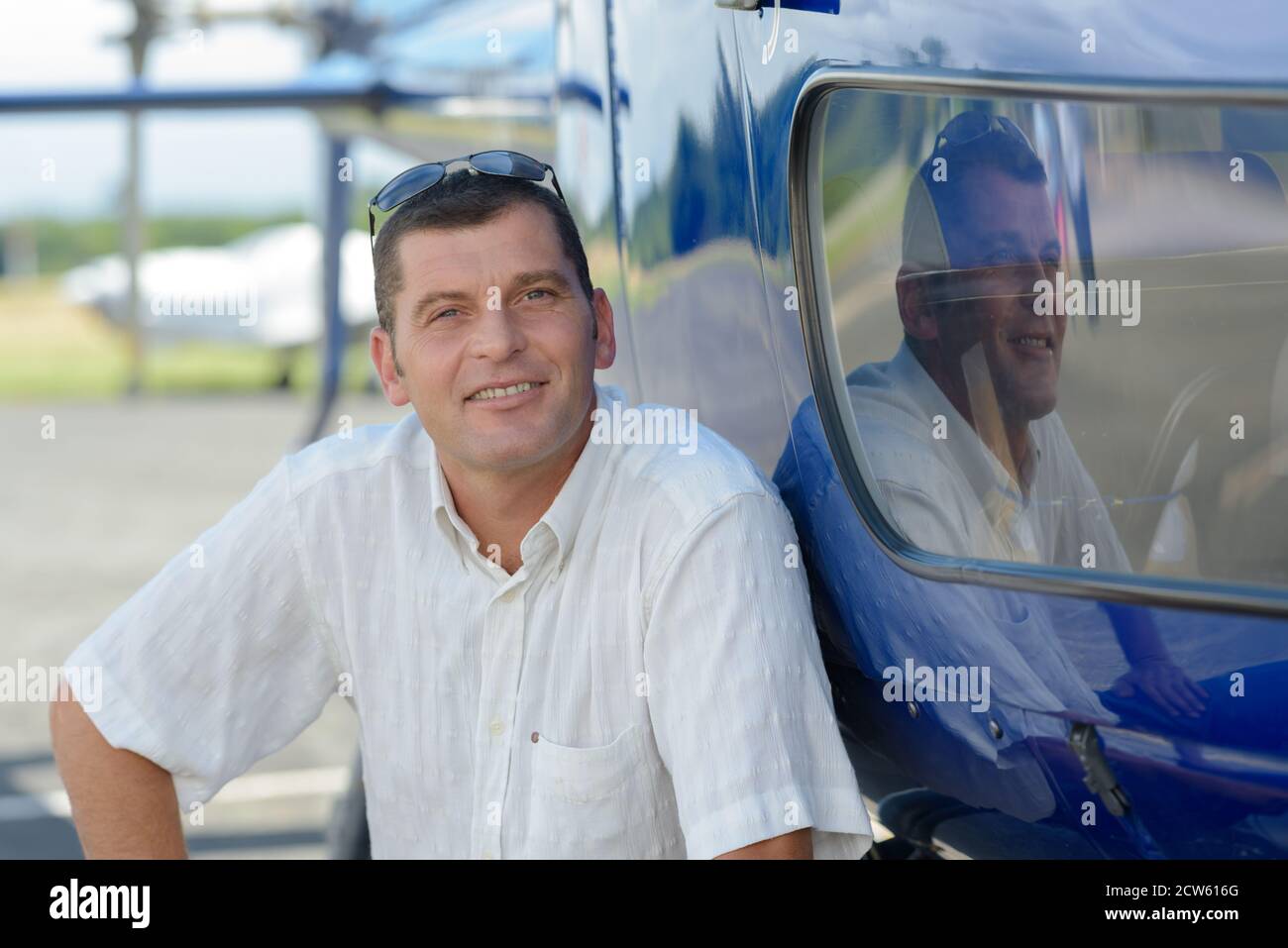 pilot in cockpit of helicopter during flight Stock Photo - Alamy