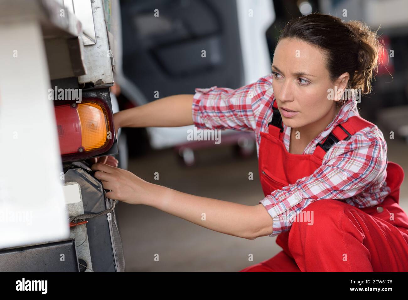 female camper van assembler at work Stock Photo - Alamy