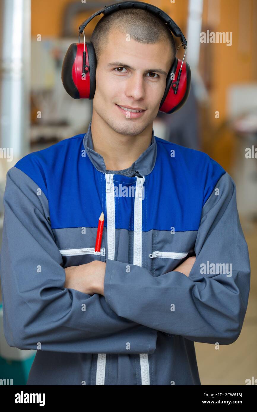 portrait of young engineer smiling Stock Photo - Alamy