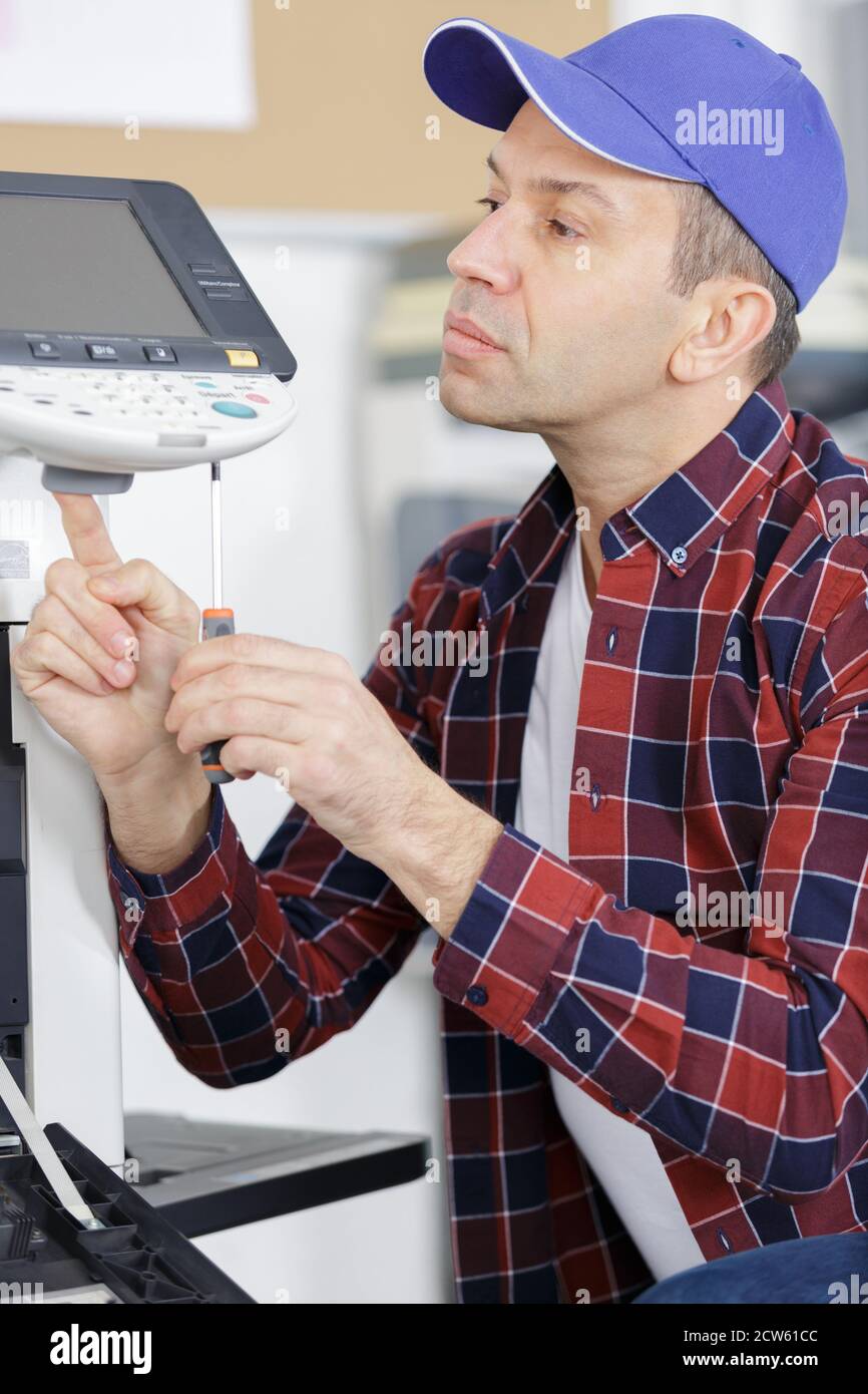 Printer checking print machine hi-res stock photography and images - Alamy