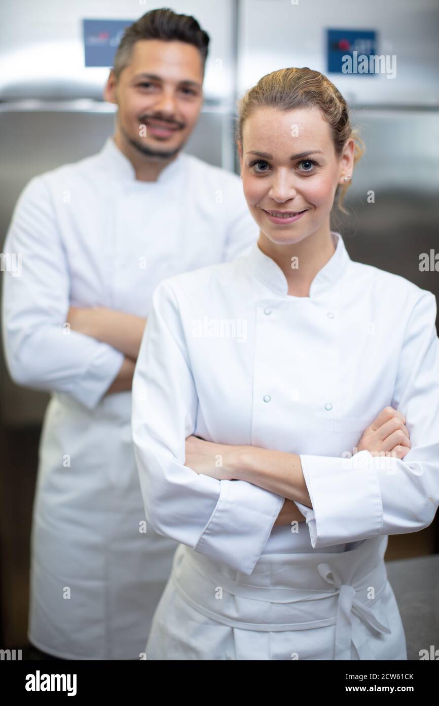 professional chefs cooking in industrial kitchen Stock Photo - Alamy