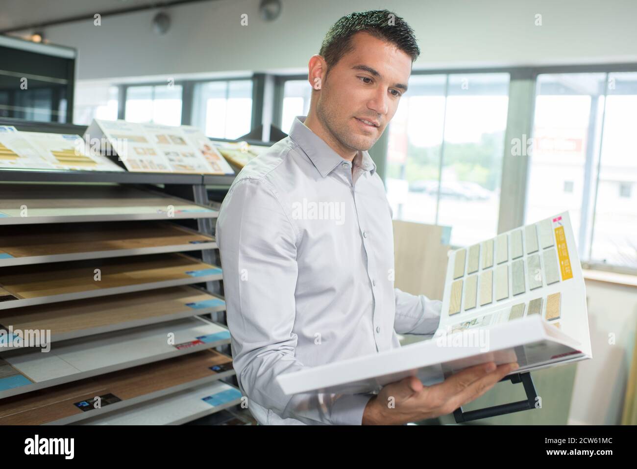 a designer with color swatches Stock Photo - Alamy