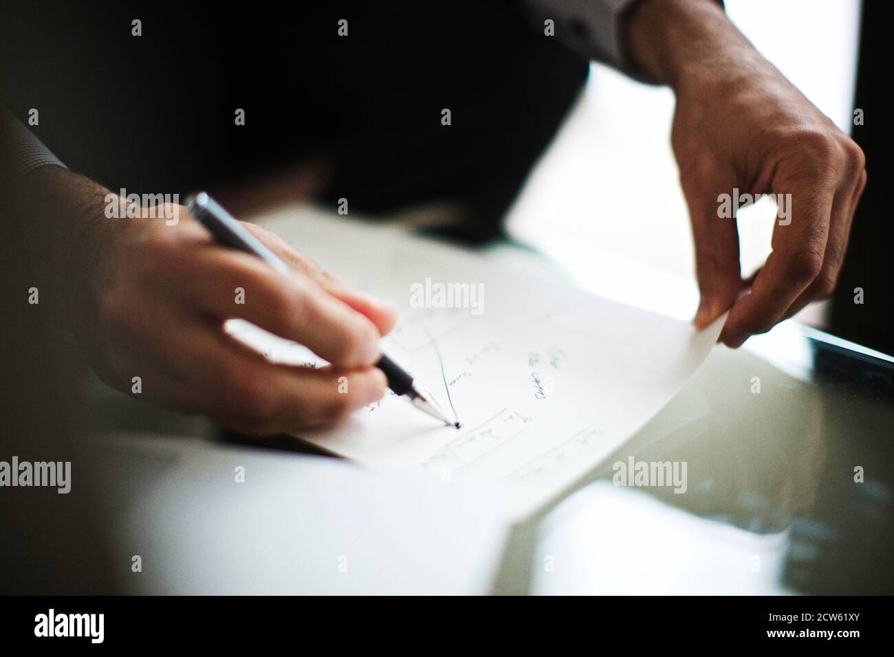 Person drawing pen hi-res stock photography and images - Alamy