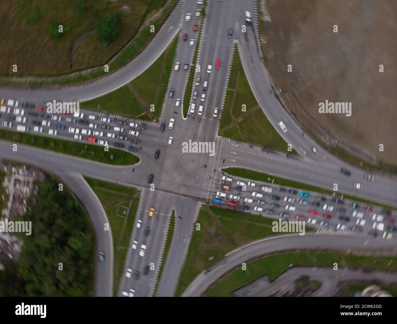Top down view of road intersection with crowded vehicles Stock Photo ...