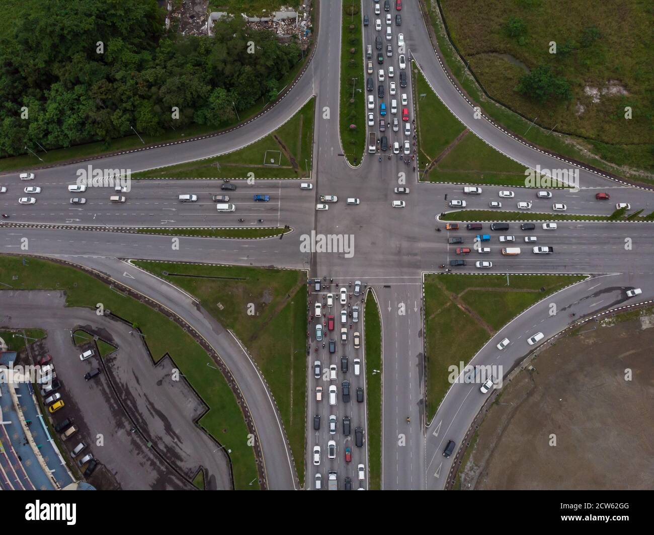 Top down view of road intersection with crowded vehicles Stock Photo ...