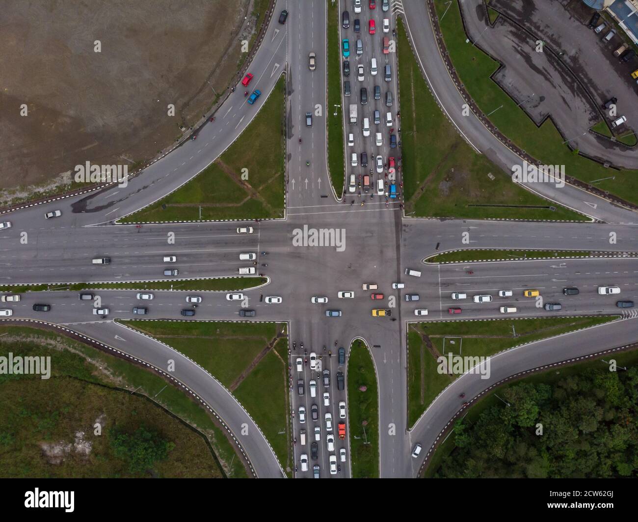 Top down view of road intersection with crowded vehicles Stock Photo ...
