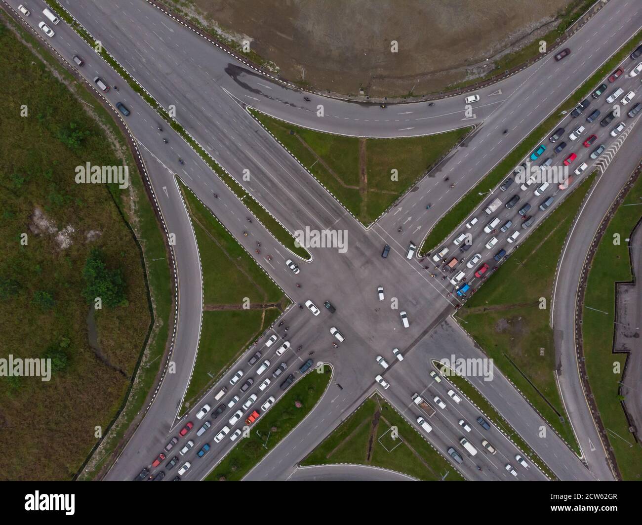 Top down view of road intersection with crowded vehicles Stock Photo ...