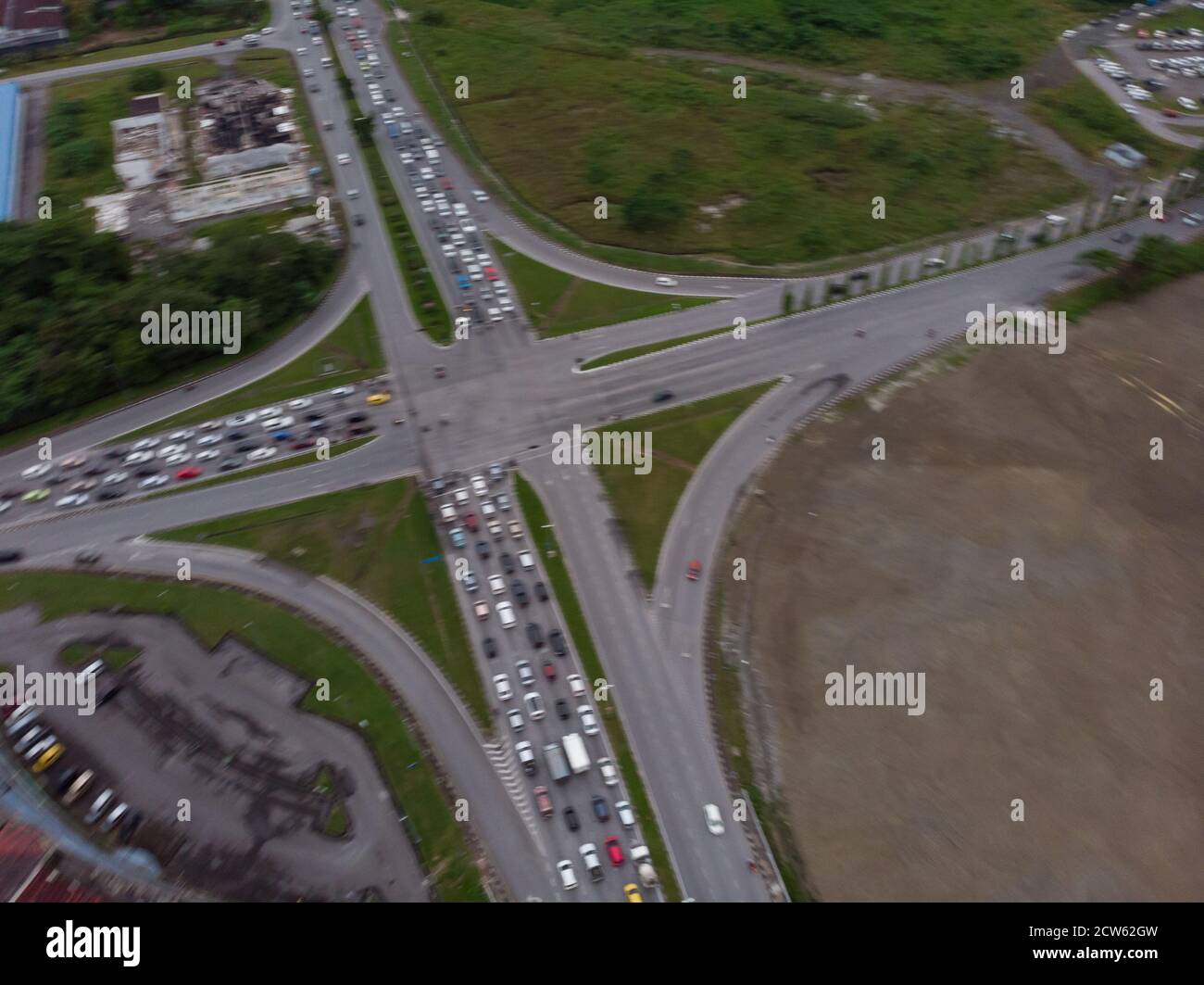 Top down view of road intersection with crowded vehicles Stock Photo ...