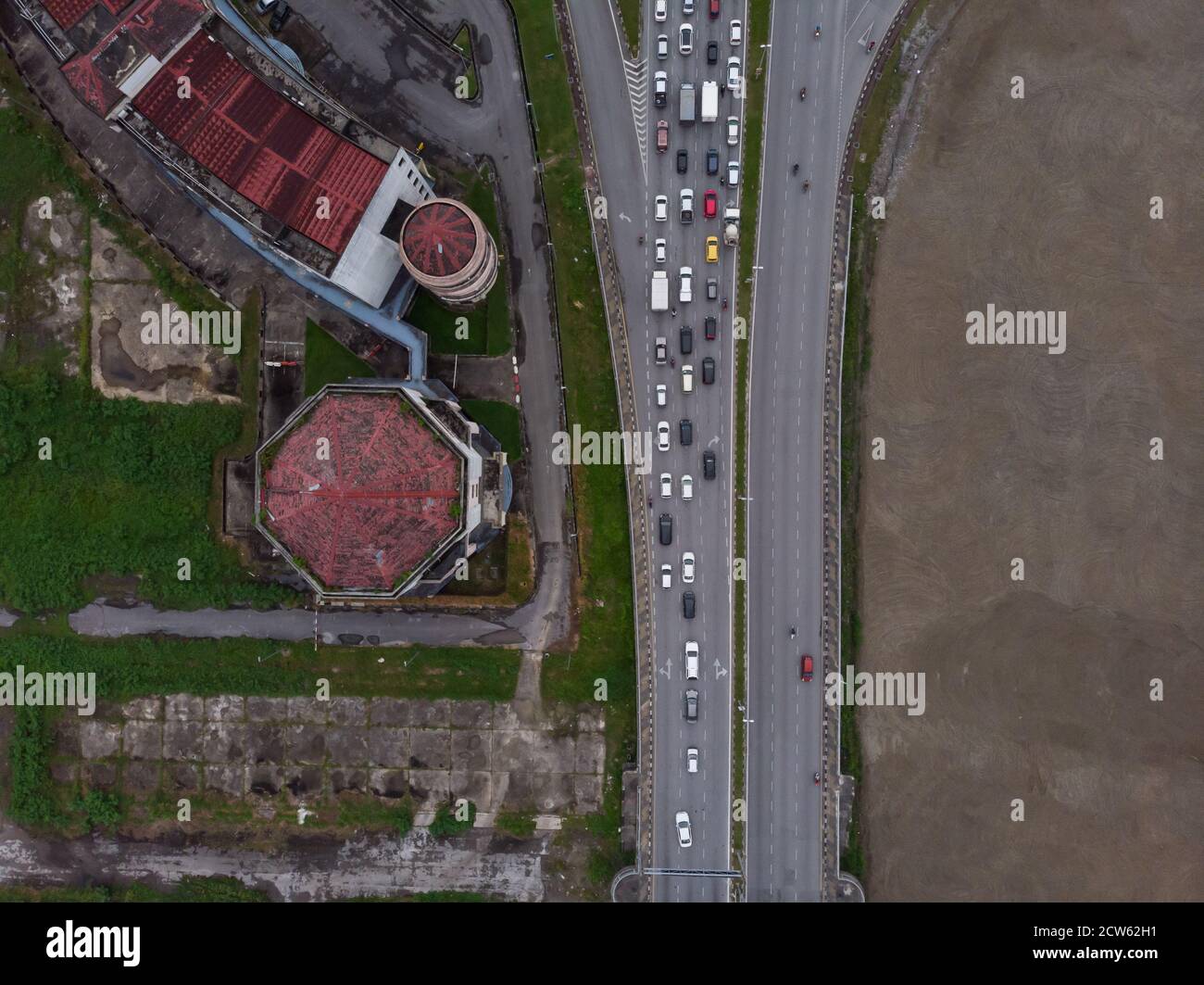 Top down view of road intersection with crowded vehicles Stock Photo ...