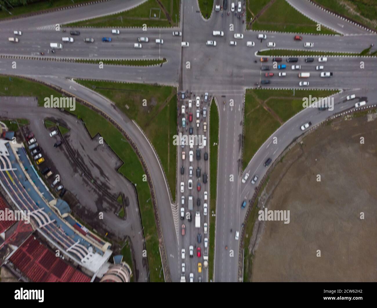 Top down view of road intersection with crowded vehicles Stock Photo ...