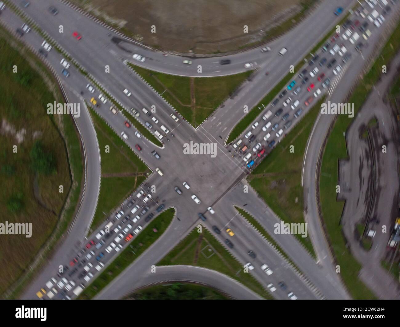 Top down view of road intersection with crowded vehicles Stock Photo ...