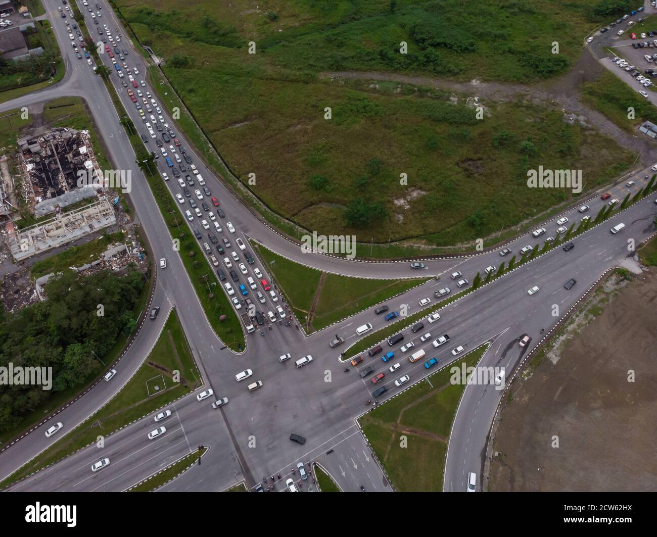 Top down view of road intersection with crowded vehicles Stock Photo ...