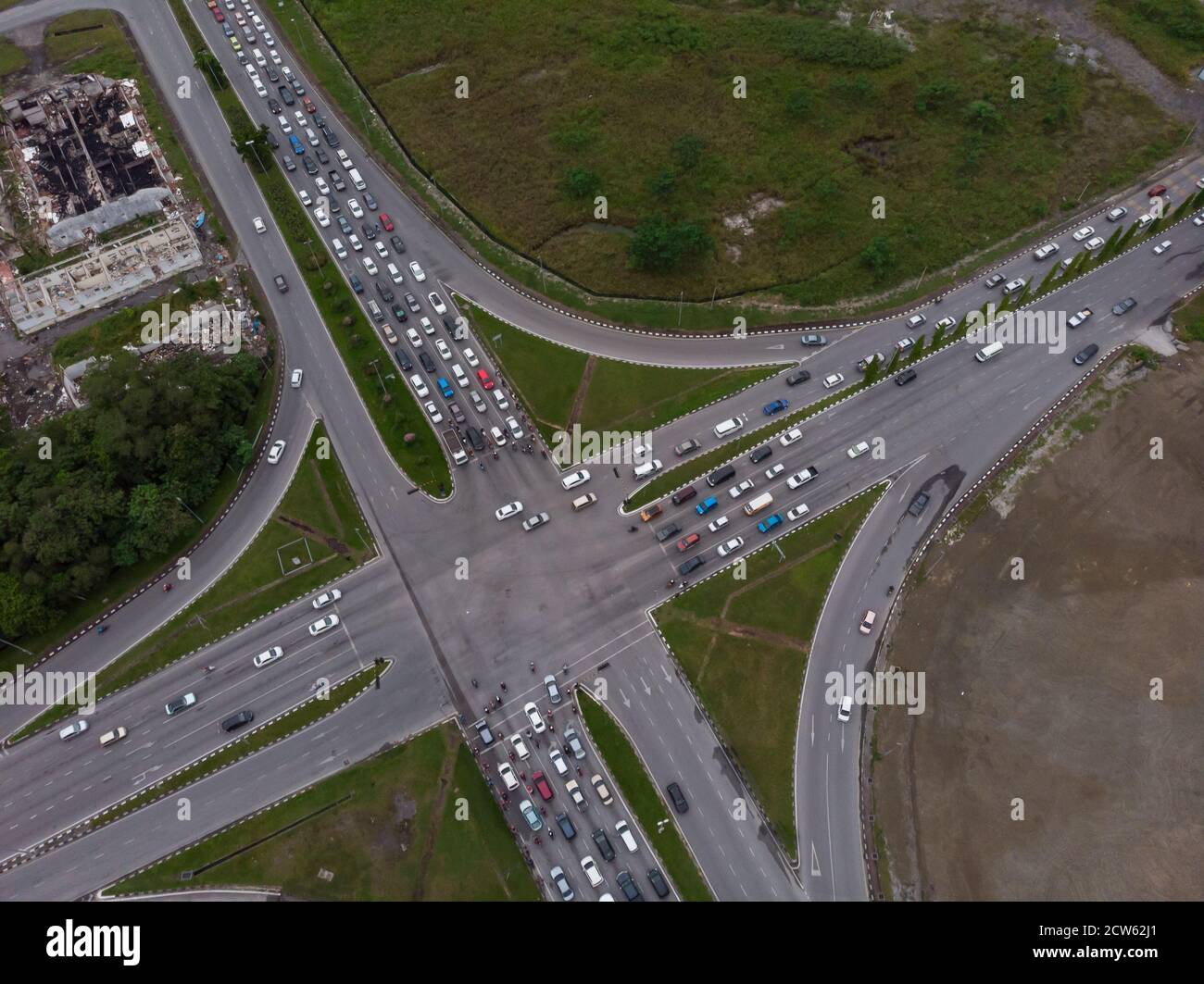Top down view of road intersection with crowded vehicles Stock Photo ...