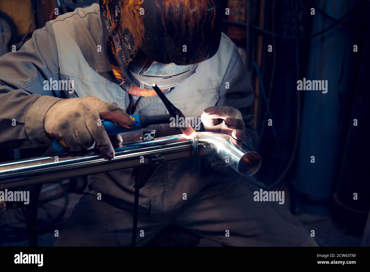 TIG welding of polished stainless steel pipe Stock Photo - Alamy