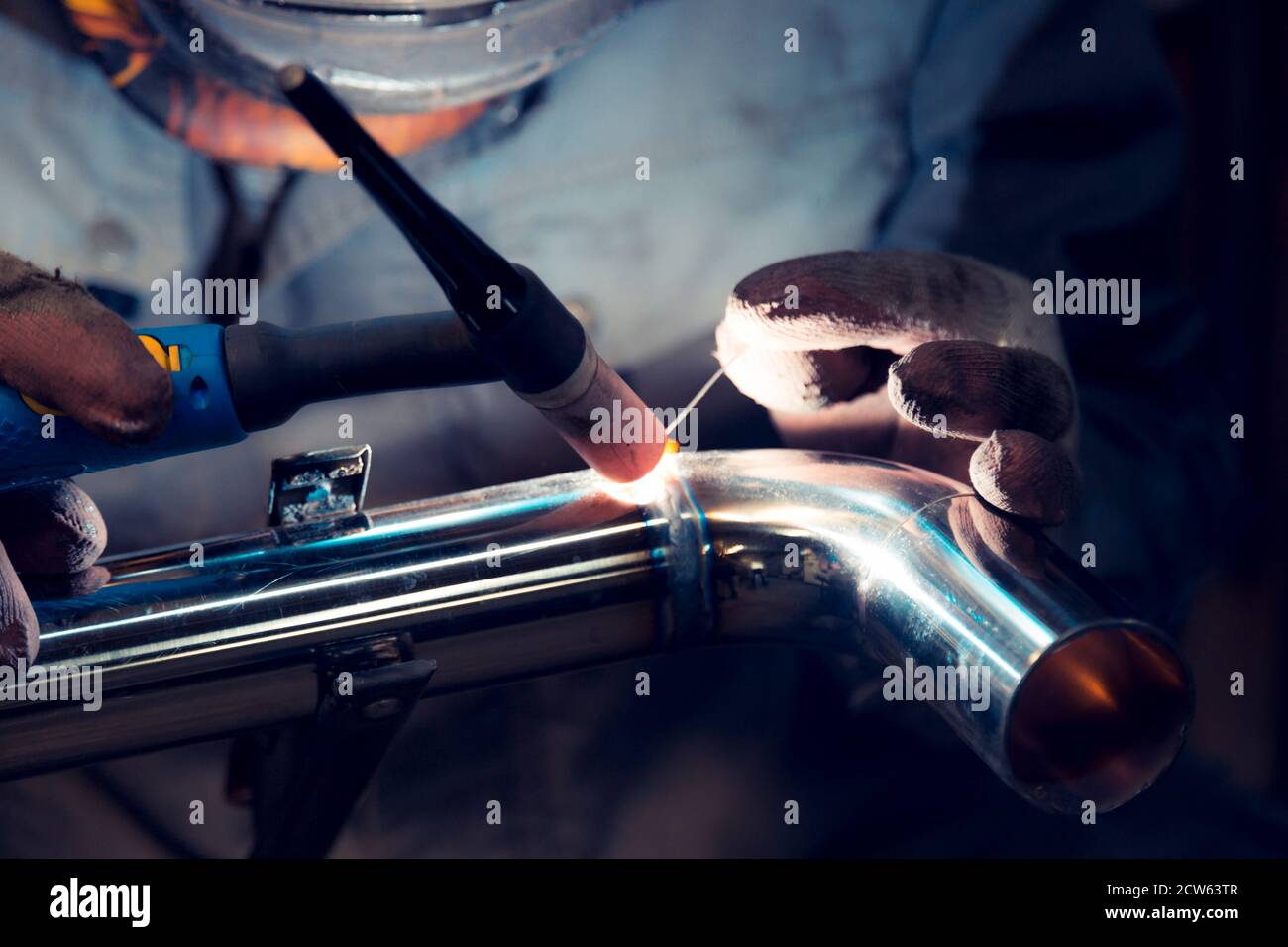 TIG welding of polished stainless steel pipe Stock Photo - Alamy