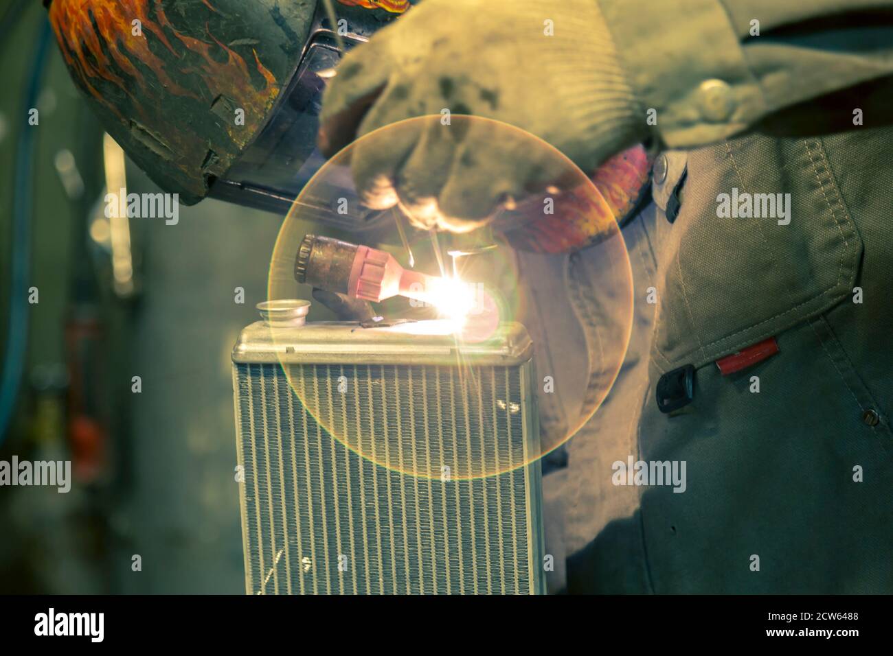 Argon arc welding aluminum radiator for car Stock Photo - Alamy